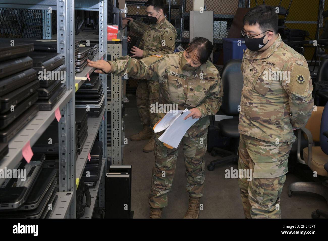 Staff Sgt. Cheyanne Gaxiola describes the change of command inventory ...