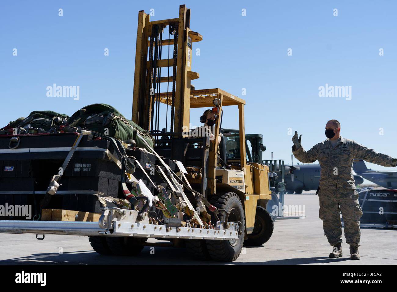 U.S. Air Force Airman 1st Class Sophie Woessner, left, 133rd Air ...