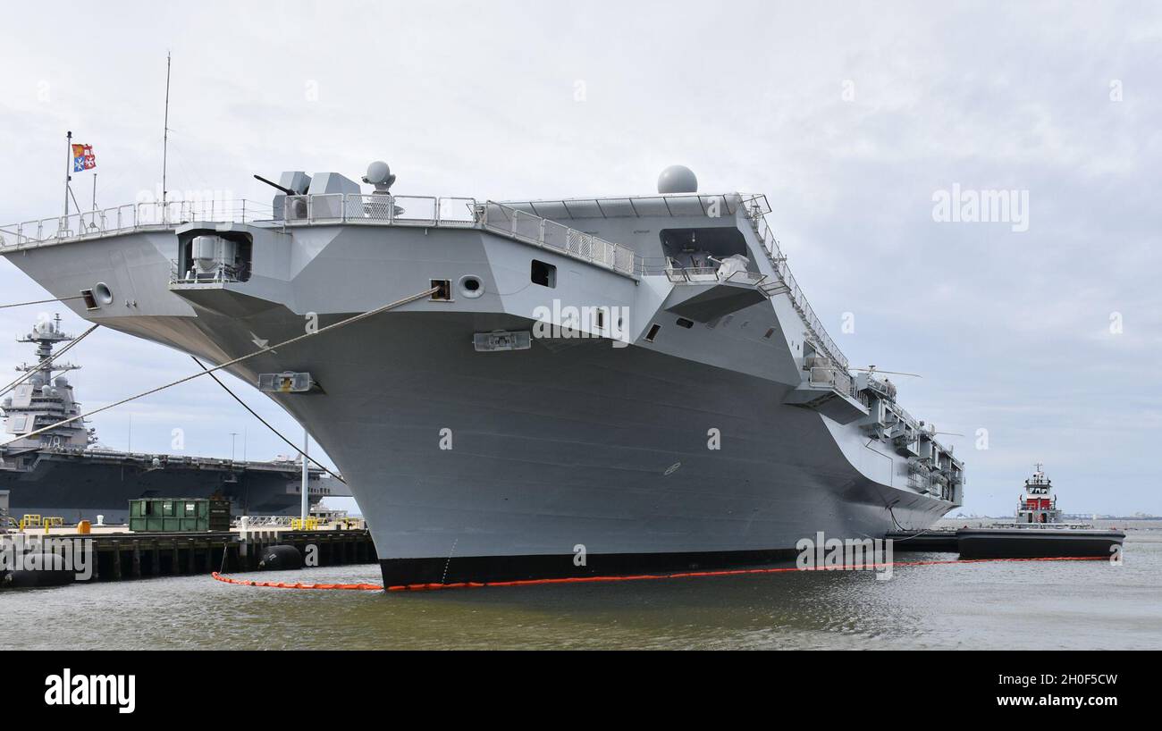 The NAVSUP FLC Norfolk refueling barge YON 323 pumps F-76 fuel to the ...