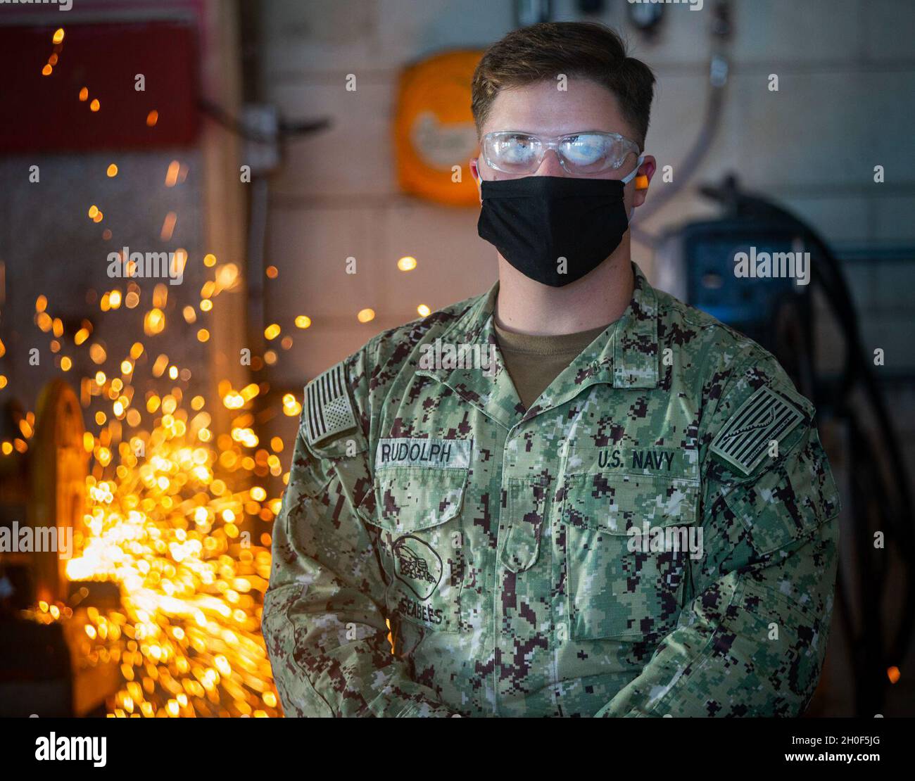 U.S. Navy Seaman Brett Rudolph, an equipment operator with General ...