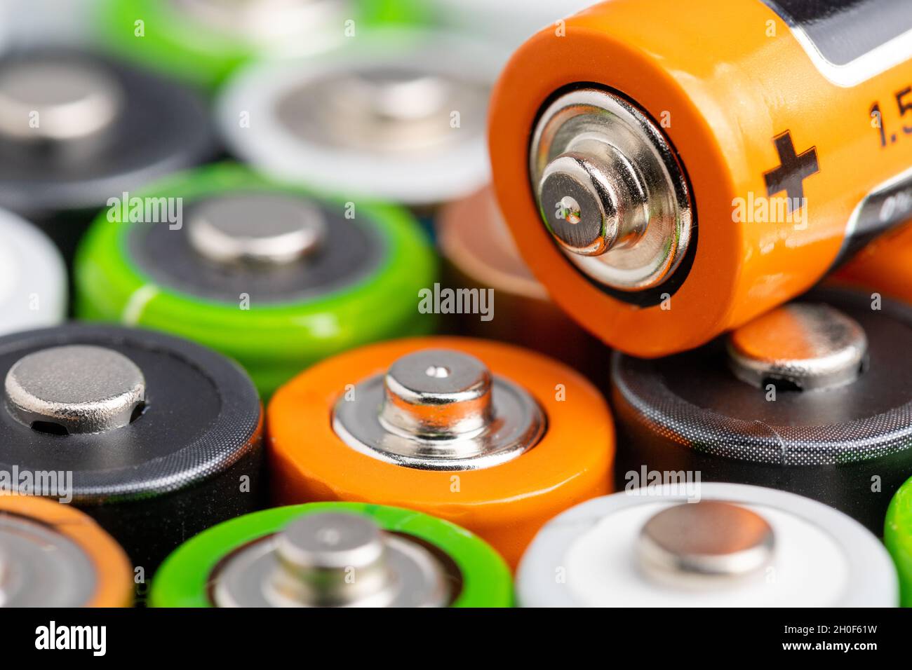 Lots of disposable colored batteries Stock Photo - Alamy
