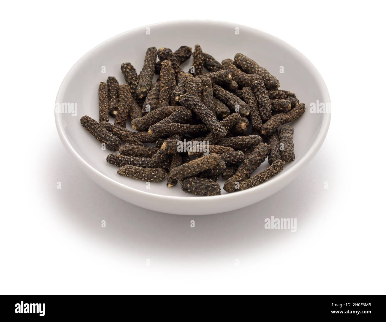 dried long peppers isolated on white background Stock Photo - Alamy