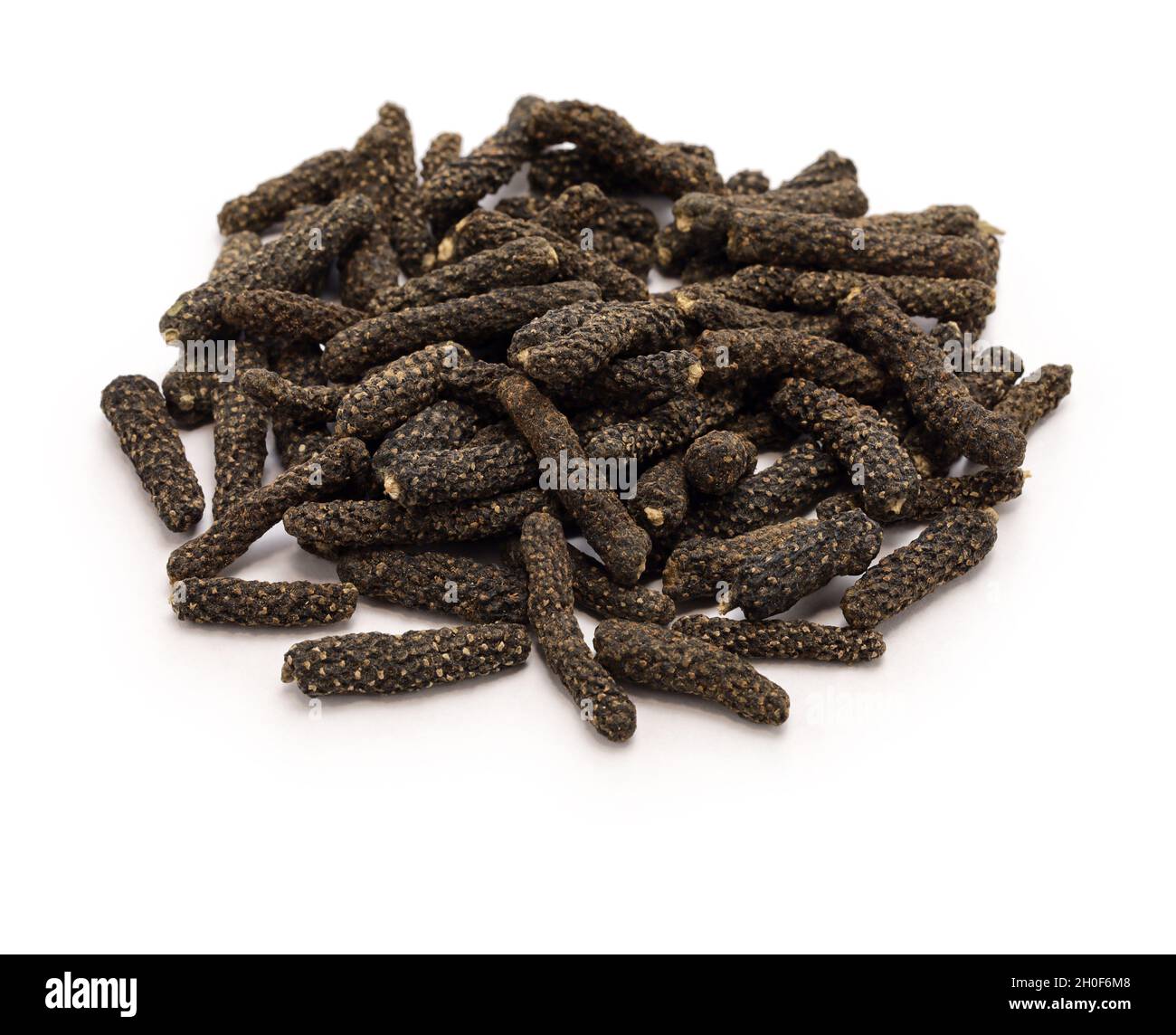 dried long peppers isolated on white background Stock Photo - Alamy