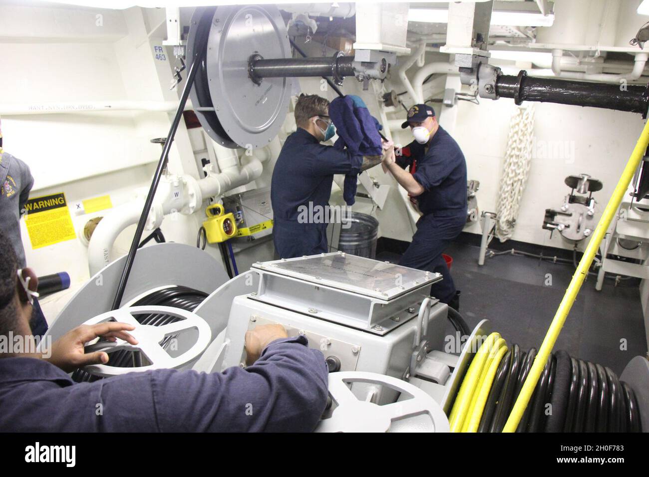 210222-N-BN188-1001 PACIFIC OCEAN (Feb. 22, 2021) Sailors aboard the ...