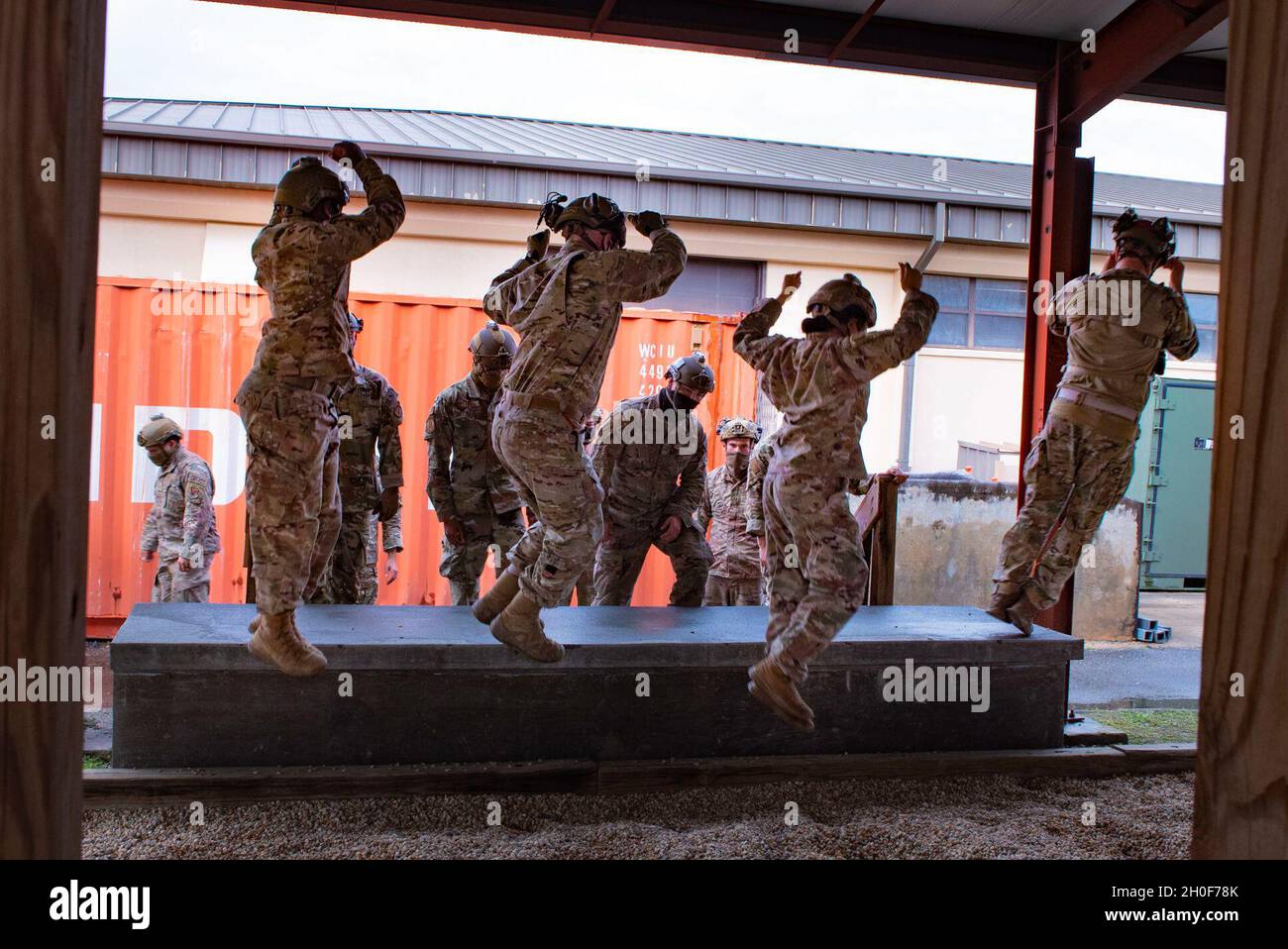 Airmen assigned to the 820th Base Defense Group practice landing before ...