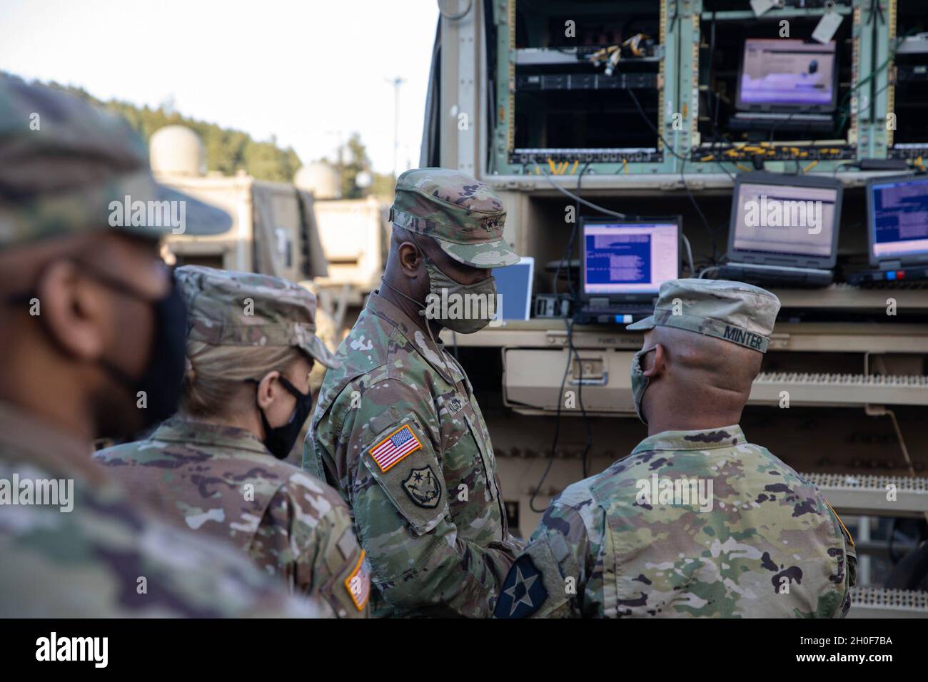U.S. Army soldier Spc. Brandon Minter (right) assigned to 1st Battalion ...