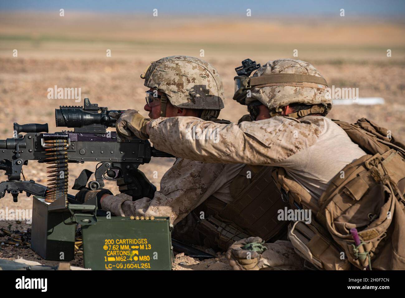 U.S. Marine Corps Lance Cpl. Johnathan Hooker, left, an anti-tank ...