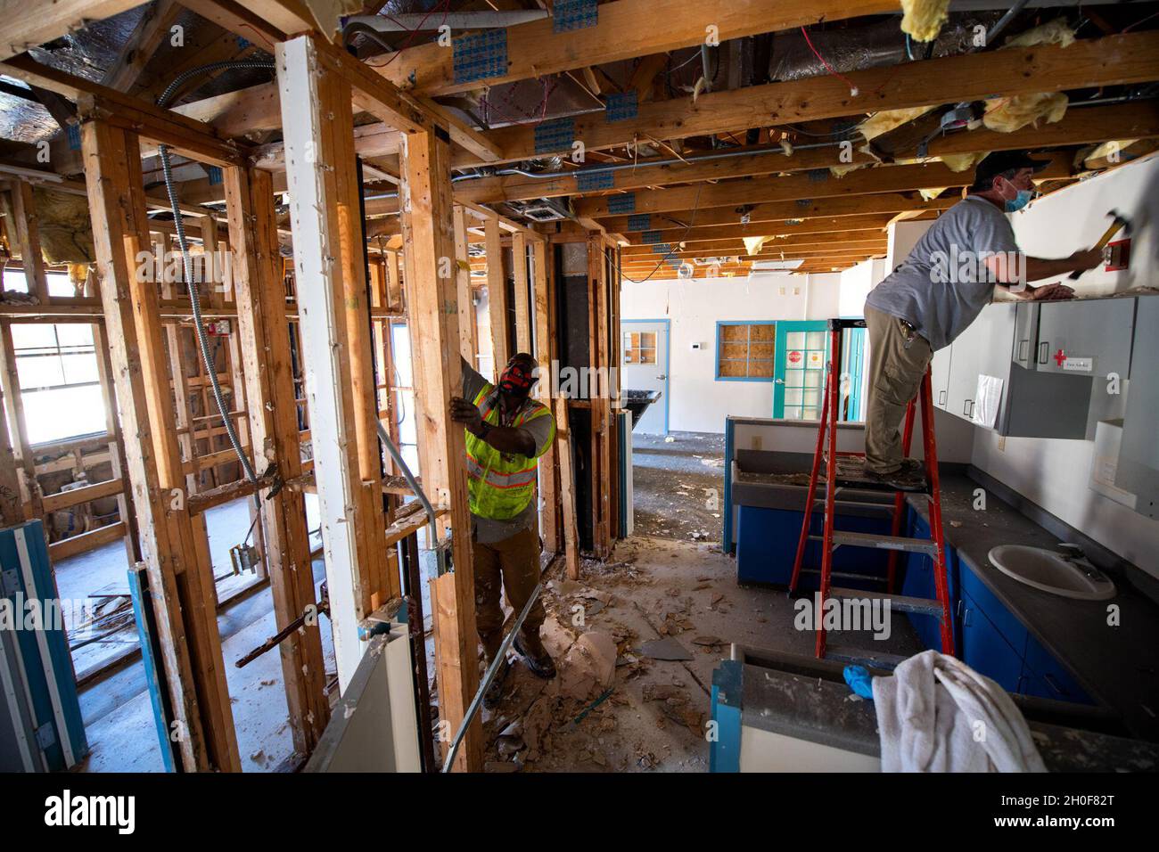 Samuel Burrell Sr. (left) and Troy Cook, 502nd Civil Engineer Squadron ...