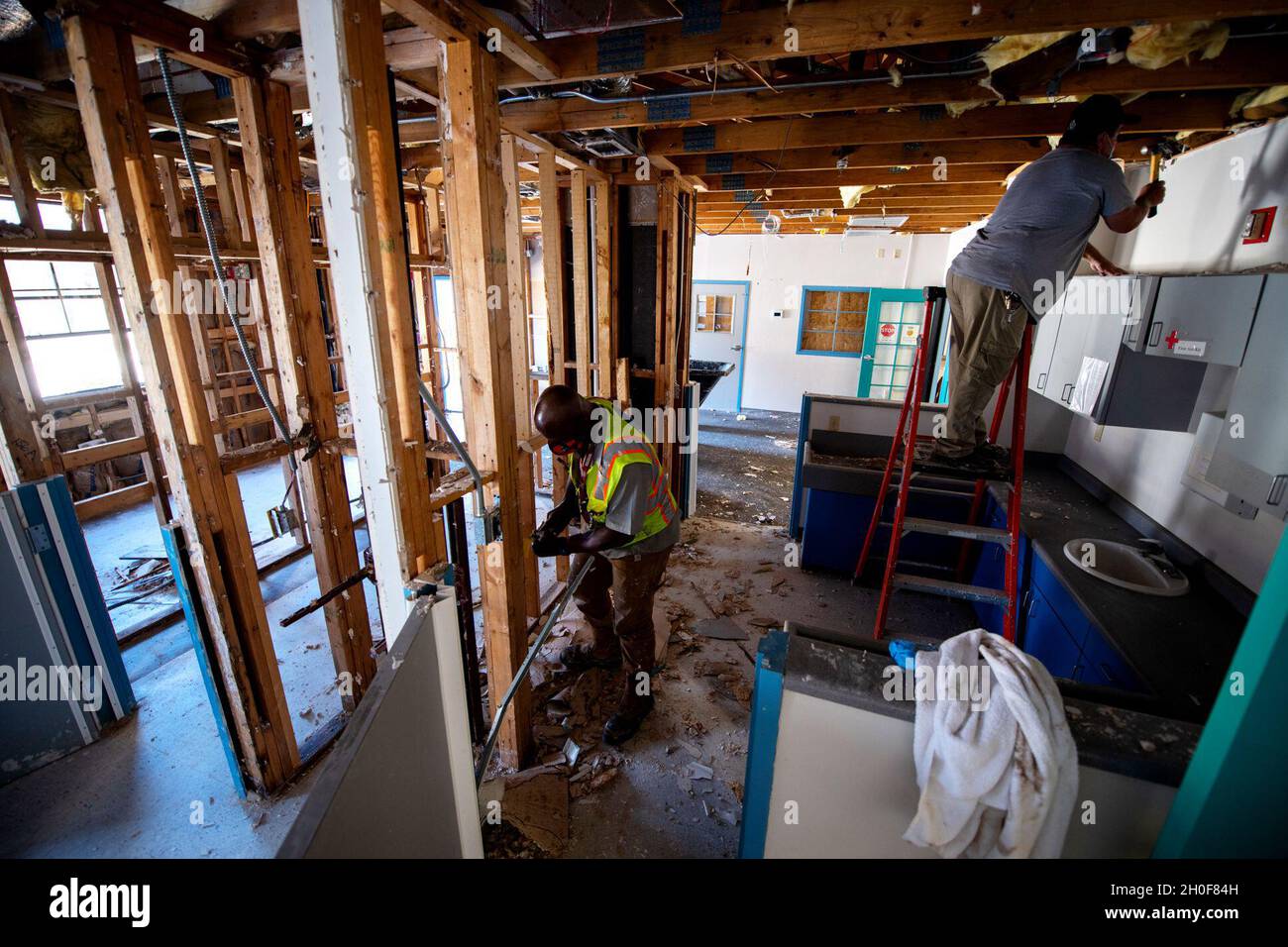 Samuel Burrell Sr. (left) and Troy Cook, 502nd Civil Engineer Squadron ...