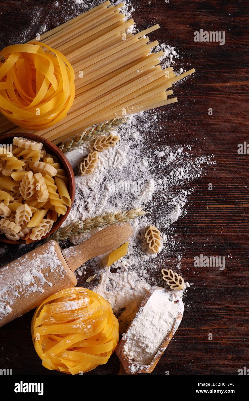 flour food background fresh pasta on wooden background Stock Photo - Alamy
