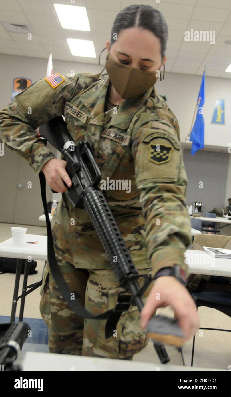 Spc. Kathleen Dougherty of the 99th Readiness Division's 78th Army Band ...