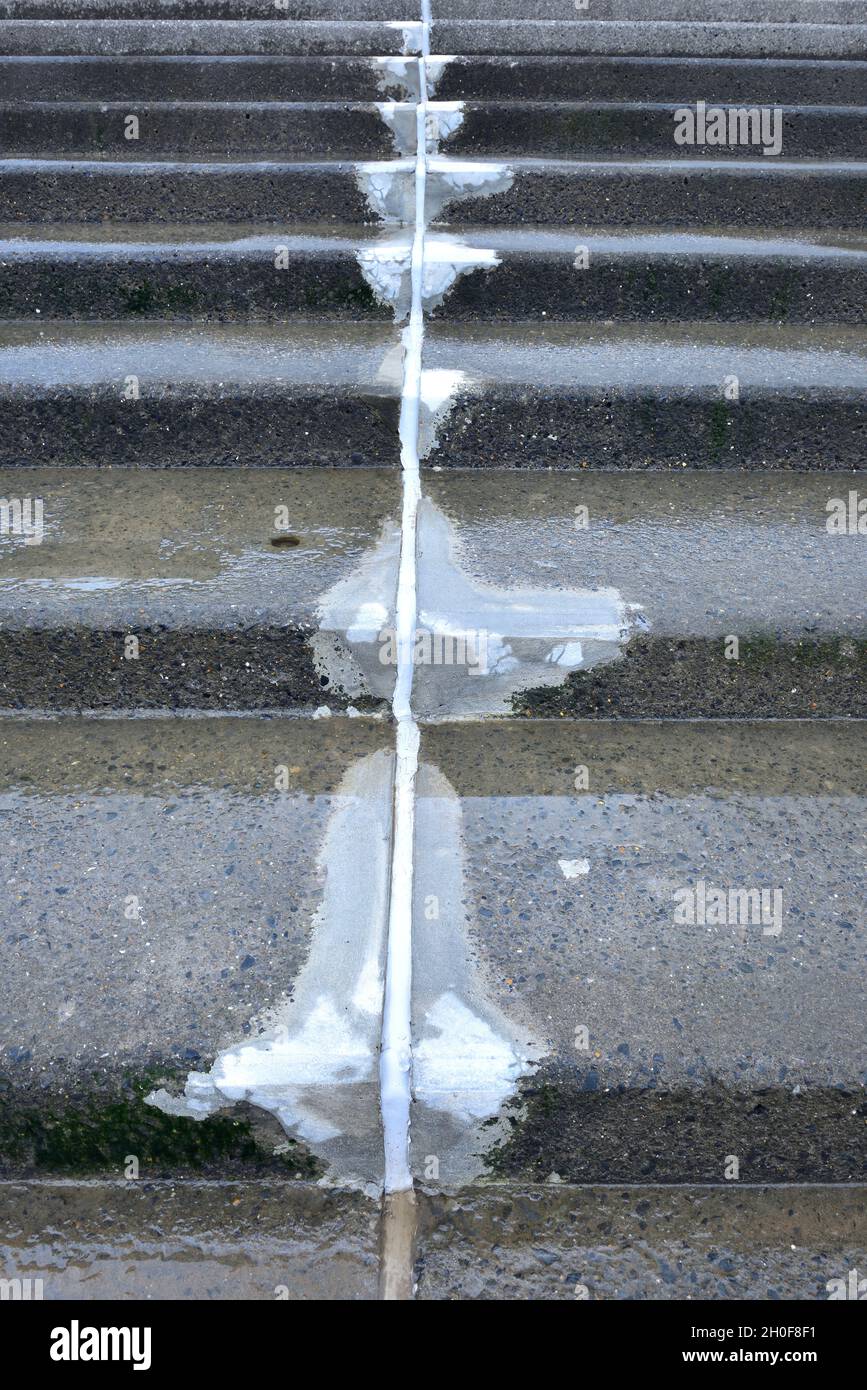 Flight of steps with a repaired expansion joint Stock Photo - Alamy