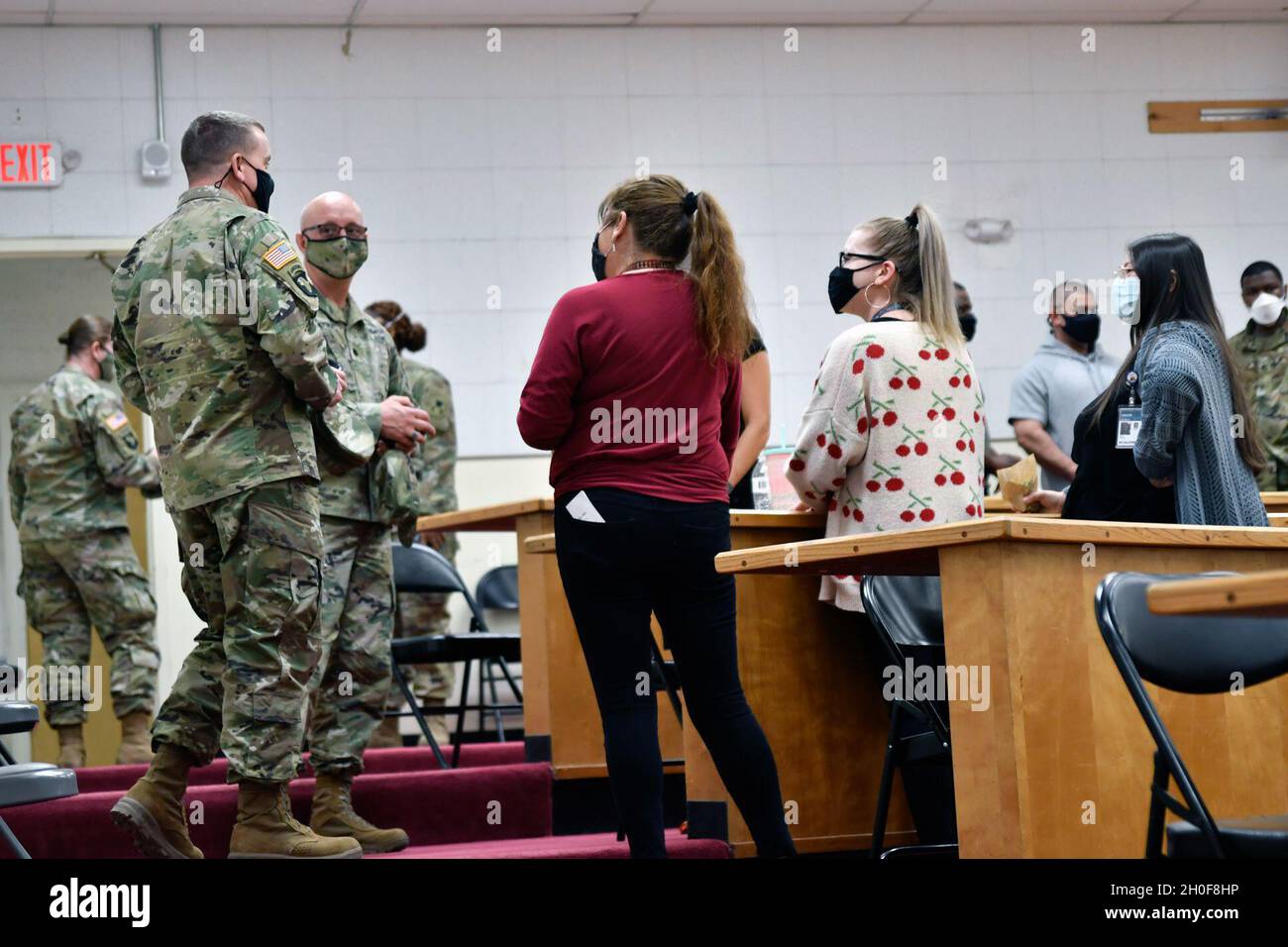 Lt. Col. Robert Mikyska, third from left, deputy commander, and Command Sgt. Maj. Thomas Brehmer ...