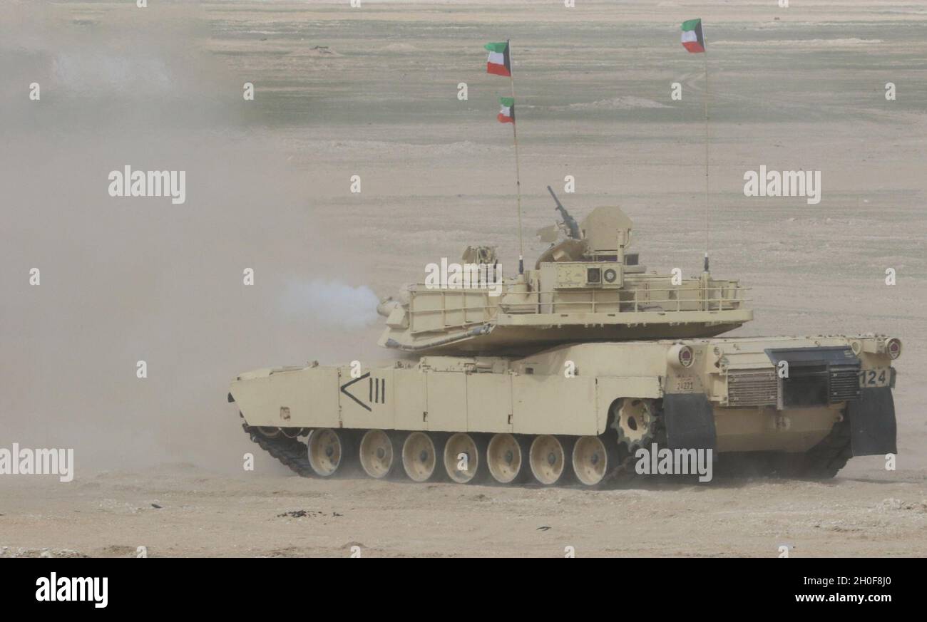 A Kuwait Land Forces tank fires rounds down range during a live-fire ...