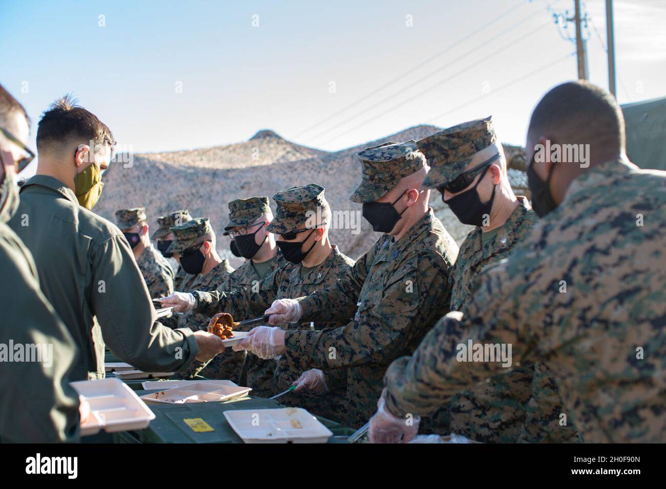 U.S. Marine Corps Col. James Lively, center, commanding officer of the ...