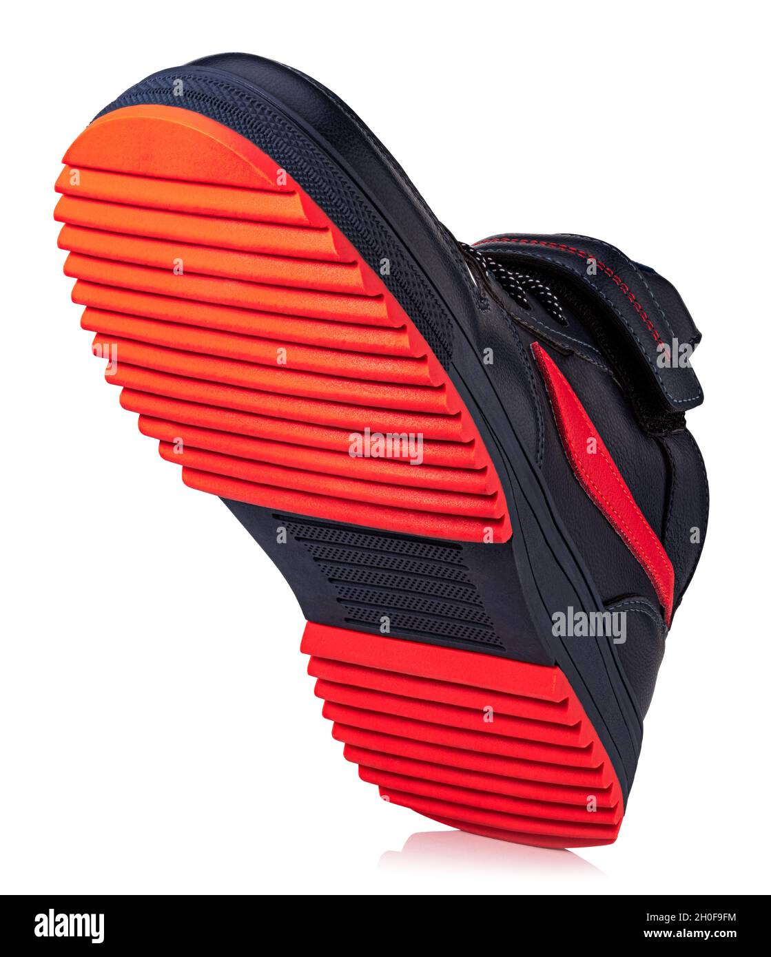 boot or sneaker with red sole isolated on white background Stock Photo ...