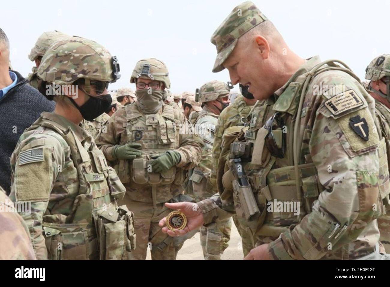 Task Force Spartan Commander, Major General Hamilton, recognizes Task ...