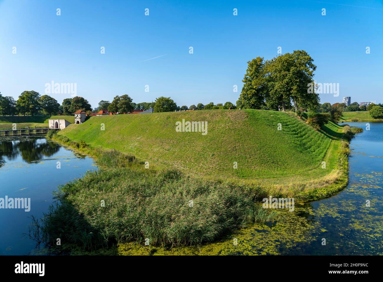 Fort of Copenhagen, green ramparts, fortress walls, pond, Denmark Stock ...