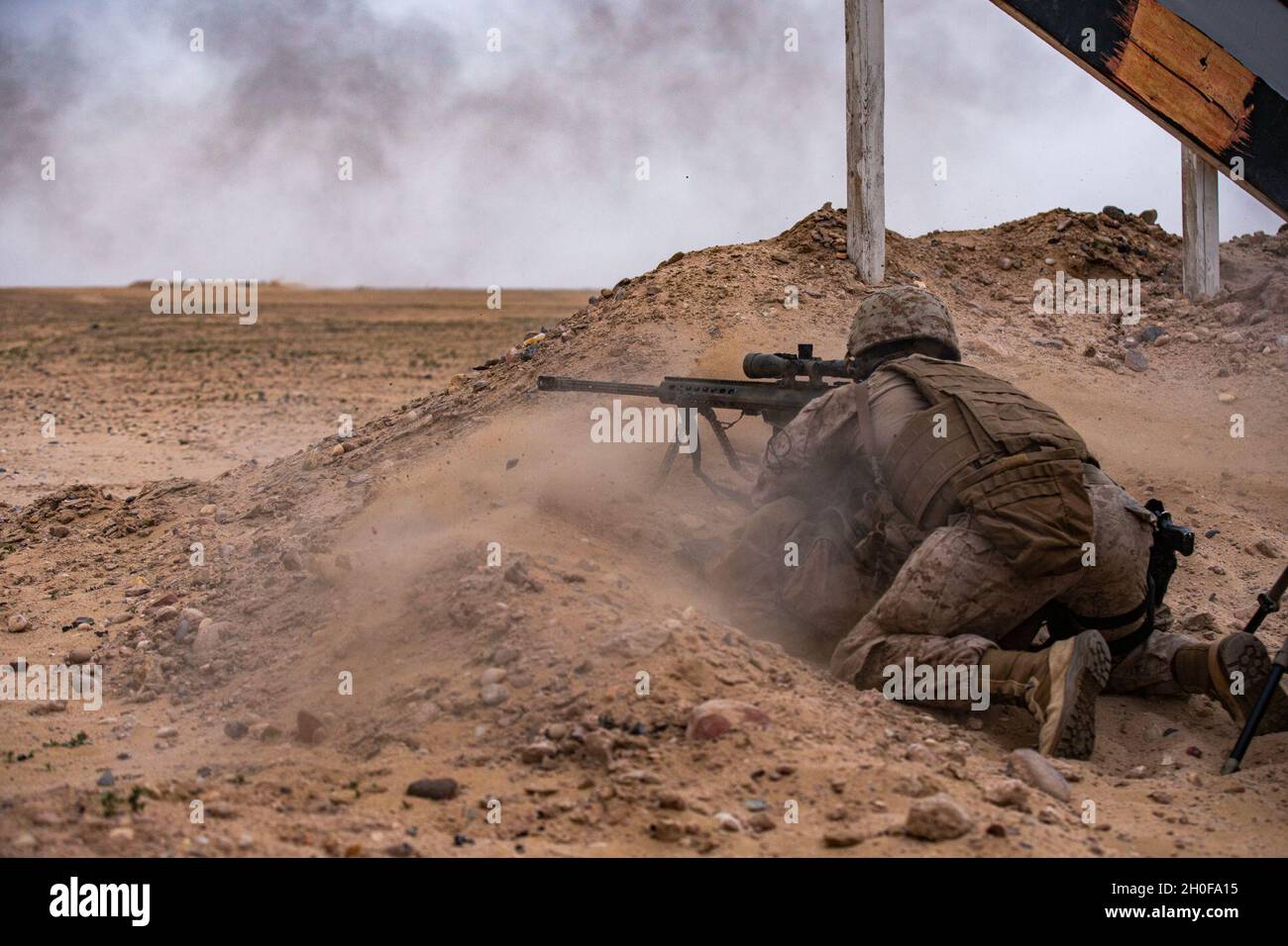 U.S. Marine Corps Cpl. Cody Blair, a scout sniper with Weapons Company, Battalion Landing Team 1 ...