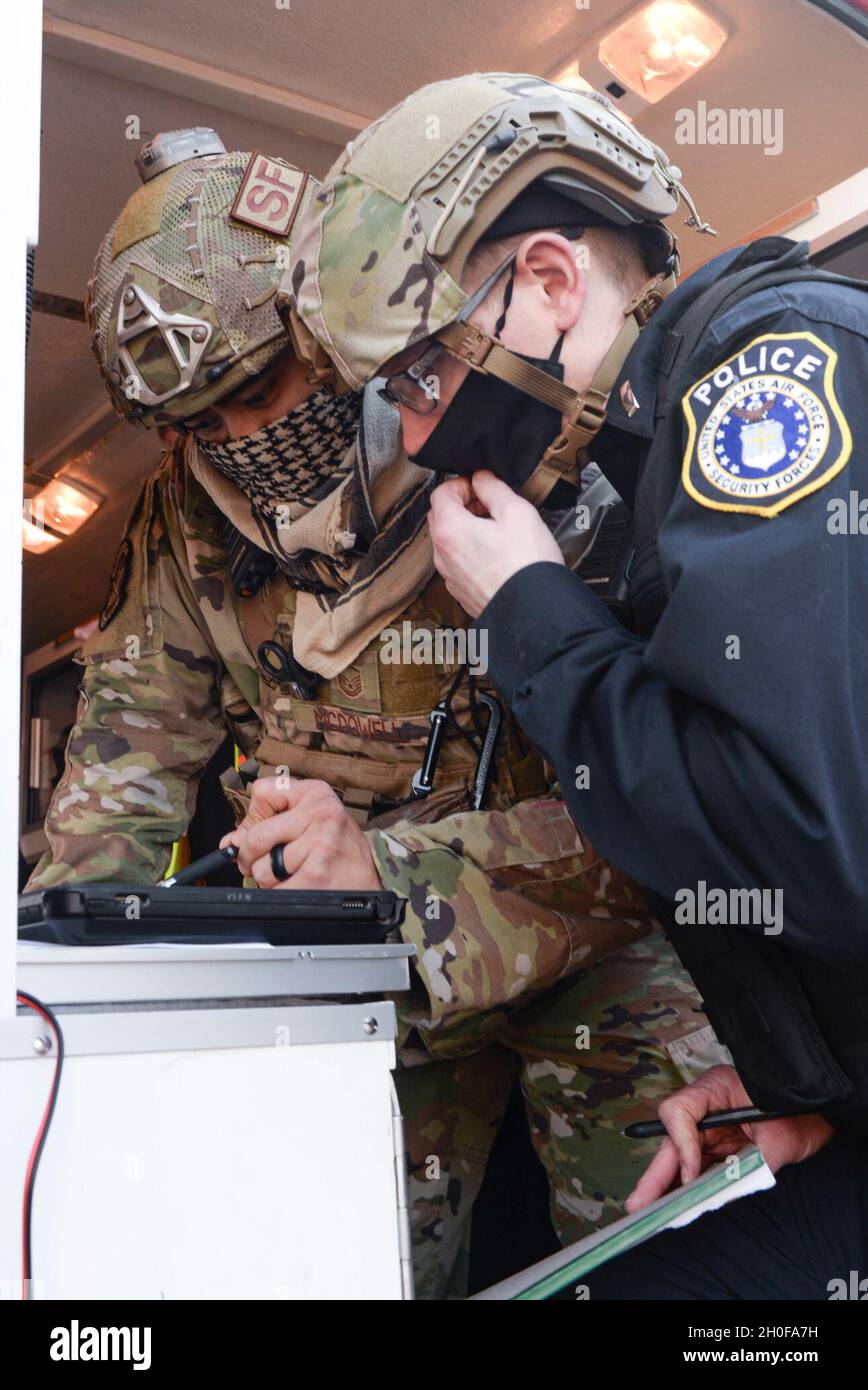 U.S. Air Force Master Sgt. Joseph McDowell and Officer Daniel Sherrell ...