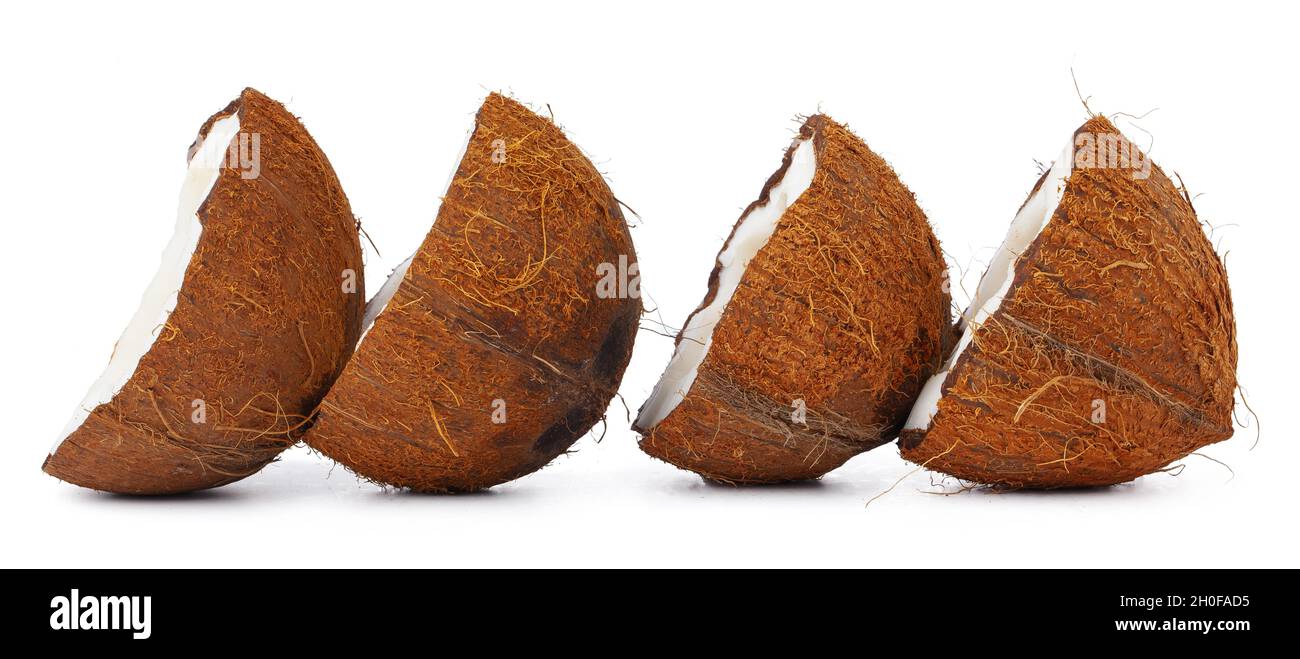 Coco nut halves isolated on white background Stock Photo - Alamy