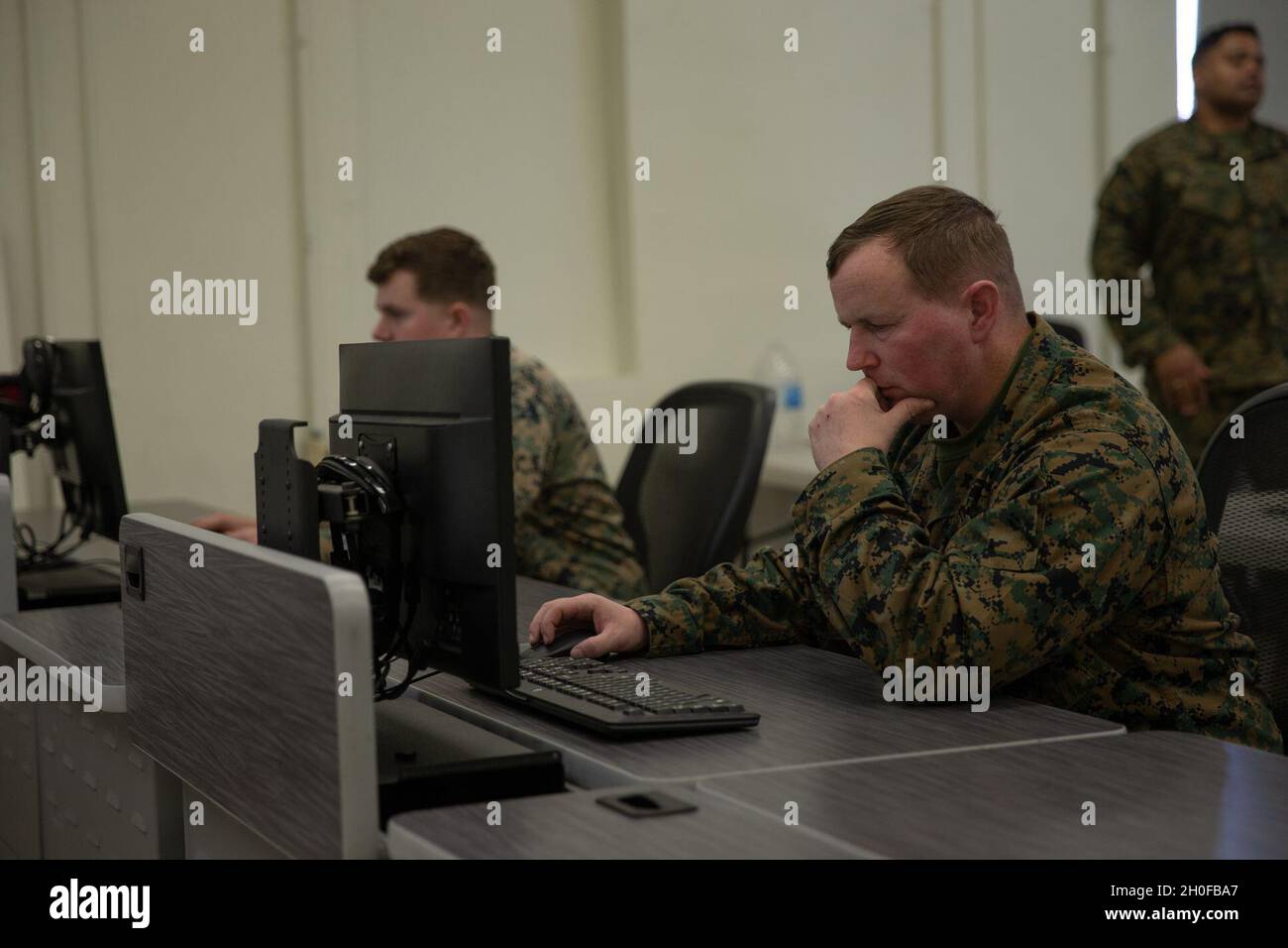 U.S. Marine Corps Sgt. Brian Kramer, a section chief with Alpha Battery ...