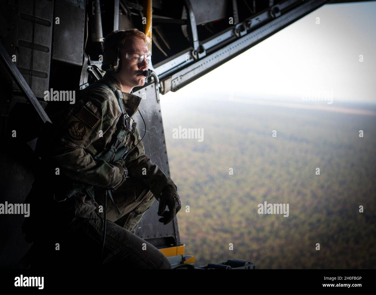 U.S. Air Force Airman 1st Class Matthew Lenz, a loadmaster assigned to ...