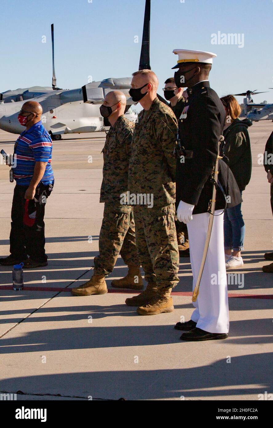 U. S. Marine Corps Sgt. Maj. Carlos A. Orjuela, left, sergeant major of ...