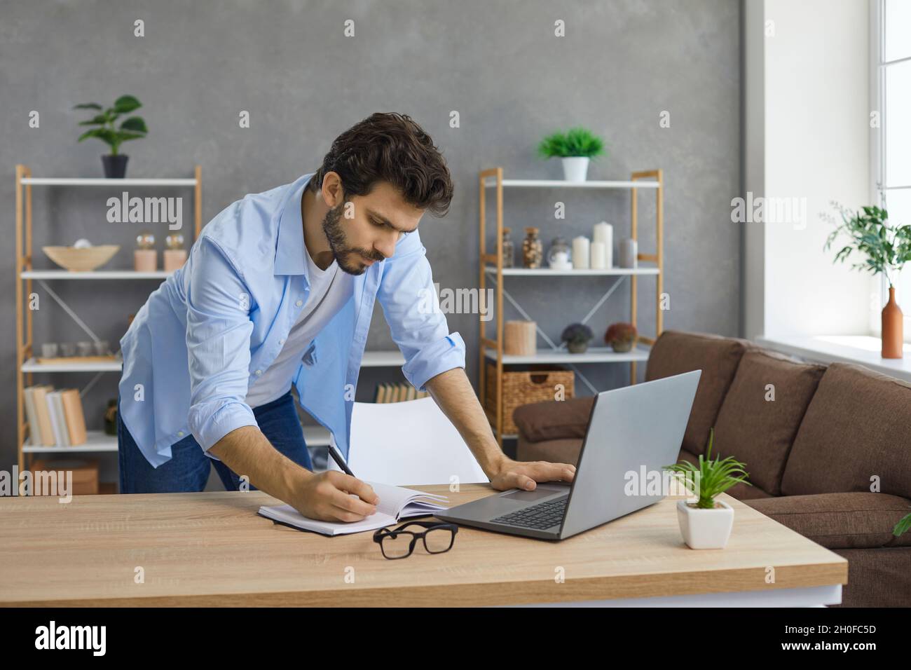 Information man desk hi-res stock photography and images - Alamy
