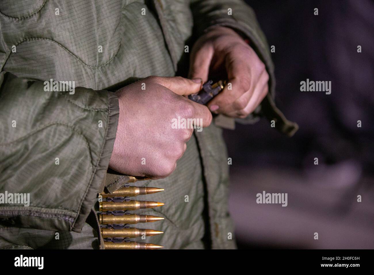 U.S. Marine Corps Lance Cpl. Spence Corey, a small arms technician with ...