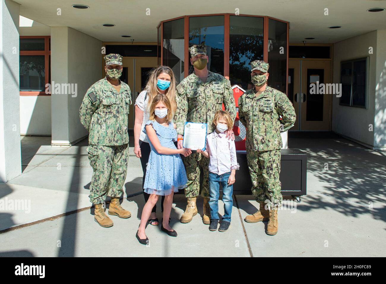 210224-N-TP832-1033 PORT HUENEME, Calif. (Feb. 24, 2021) Rear Adm. John ...