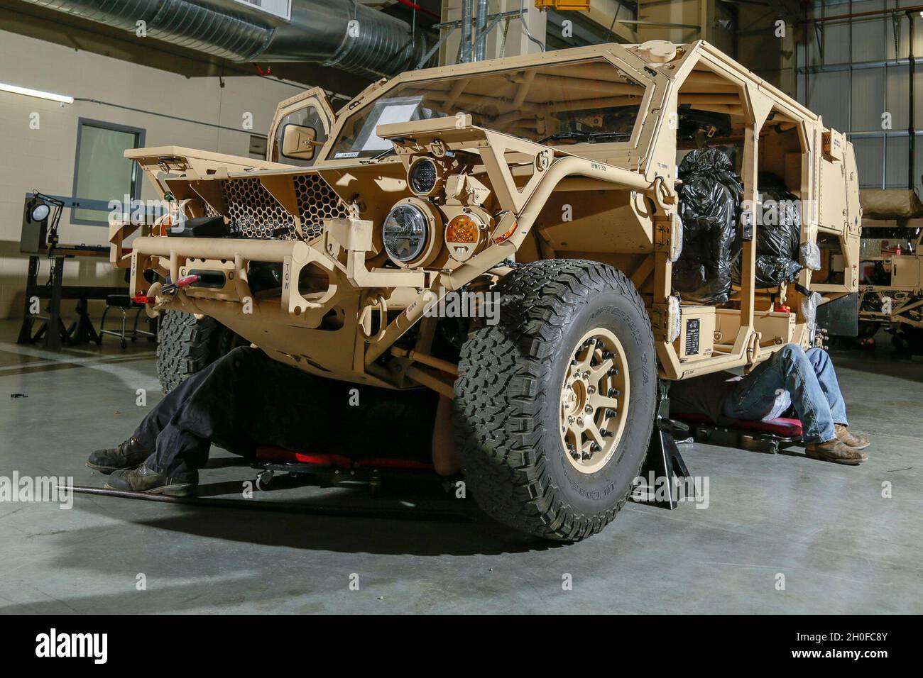 Heavy Mobile Equipment mechanics work together with mechanics from the ...
