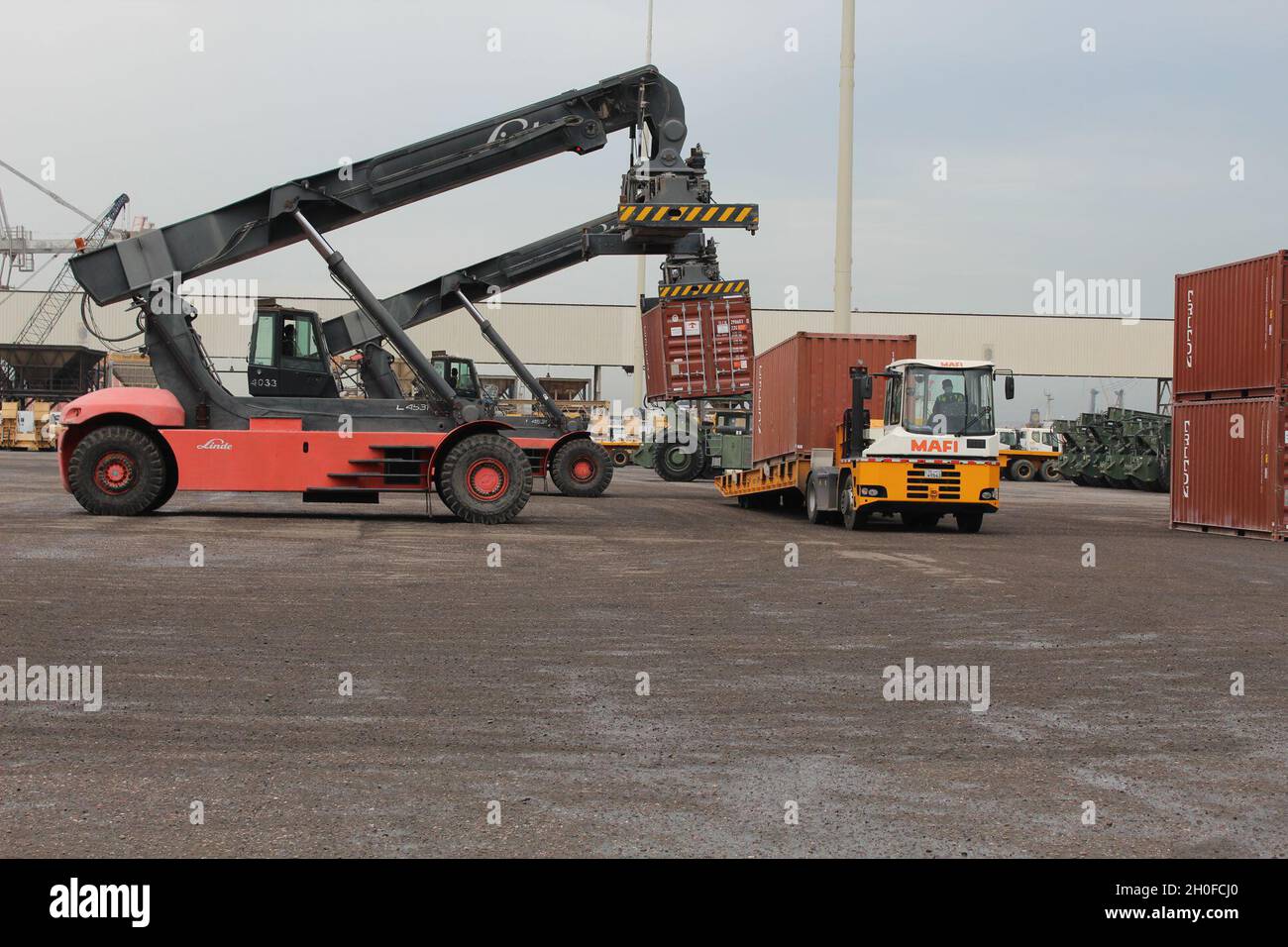 Cargo Transportation Services contractors unload 40 foot containers ...