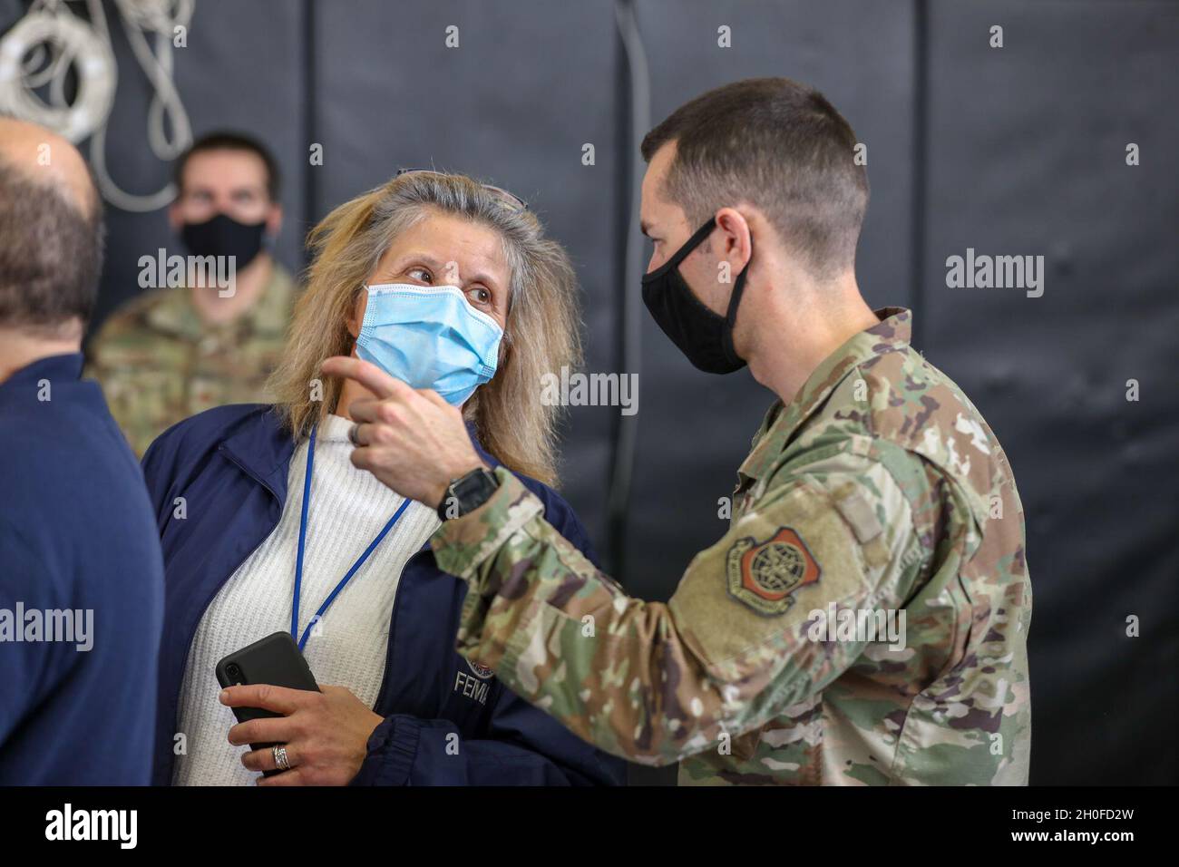 Josie Arcurio, FEMA Division Supervisor talks with U.S. Air Force Lt ...