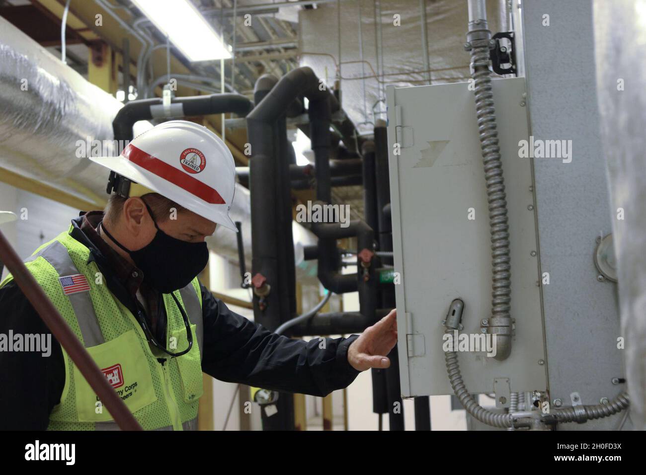 Joe Marcano, engineering tech Tulsa District, accesses building ...