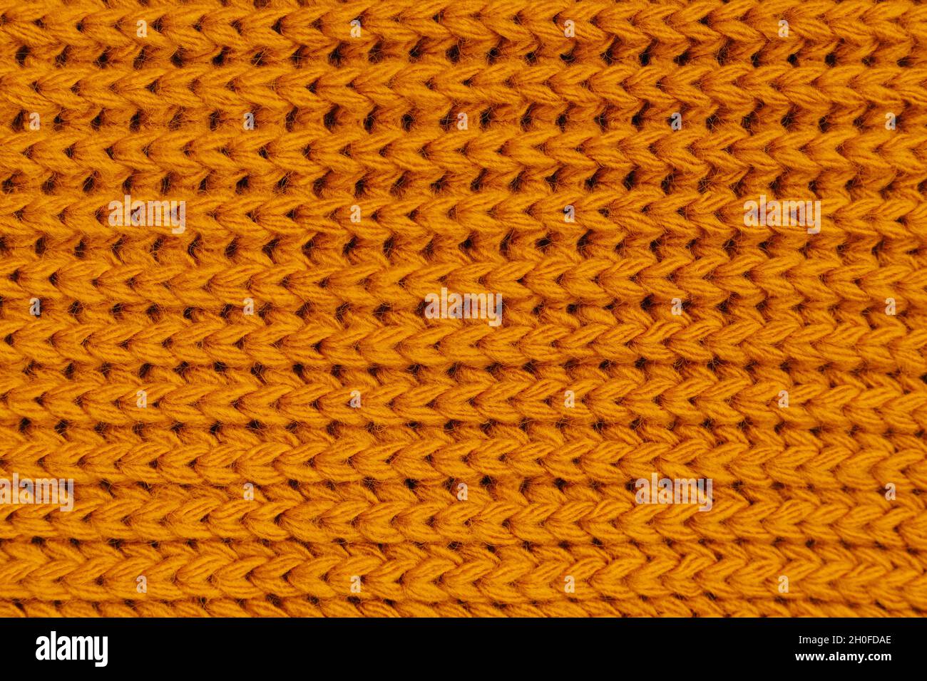 Orange autumn knitting wool texture background Stock Photo - Alamy