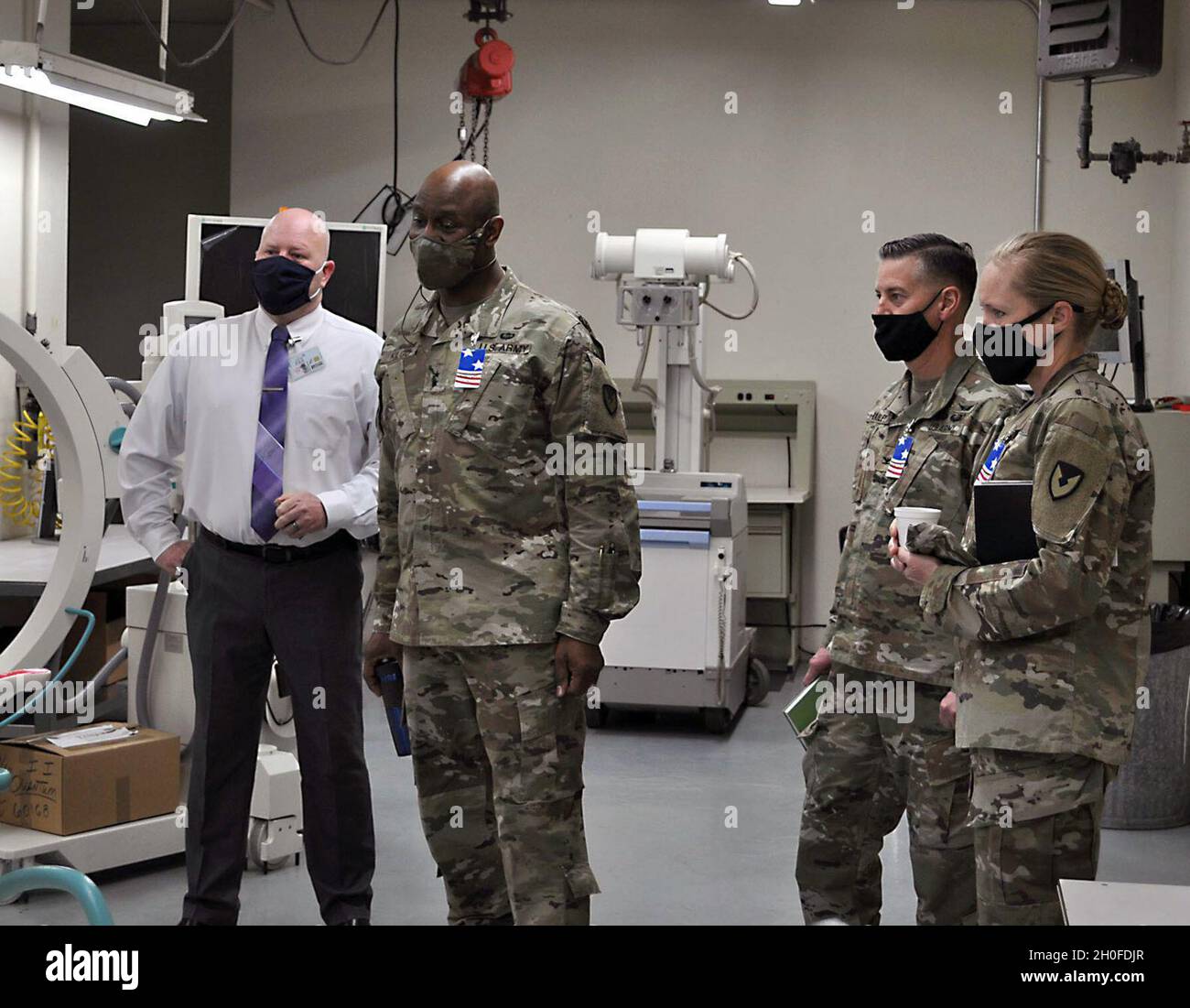 Isaac Newman, left, chief of the U.S. Army Medical Materiel Agency’s ...