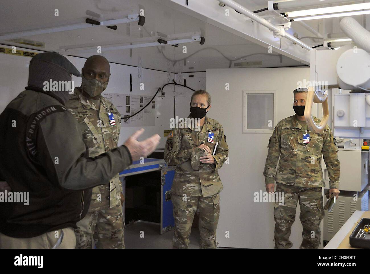 Maj. Gen. Mitchell Kilgo, second from left, commanding general of U.S ...