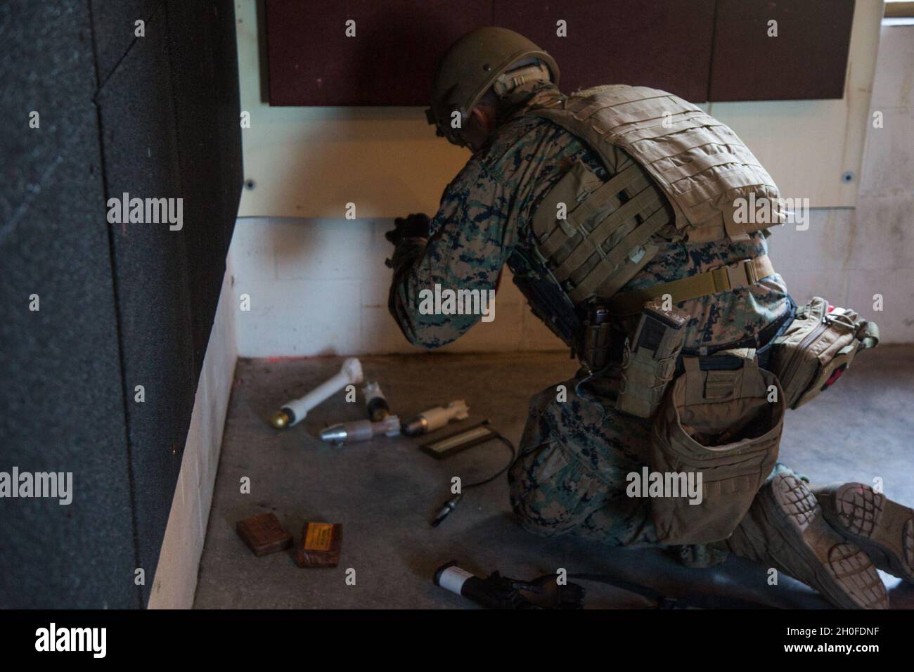 An Explosive Ordinance Disposal Marine with Marine Raider Regiment ...