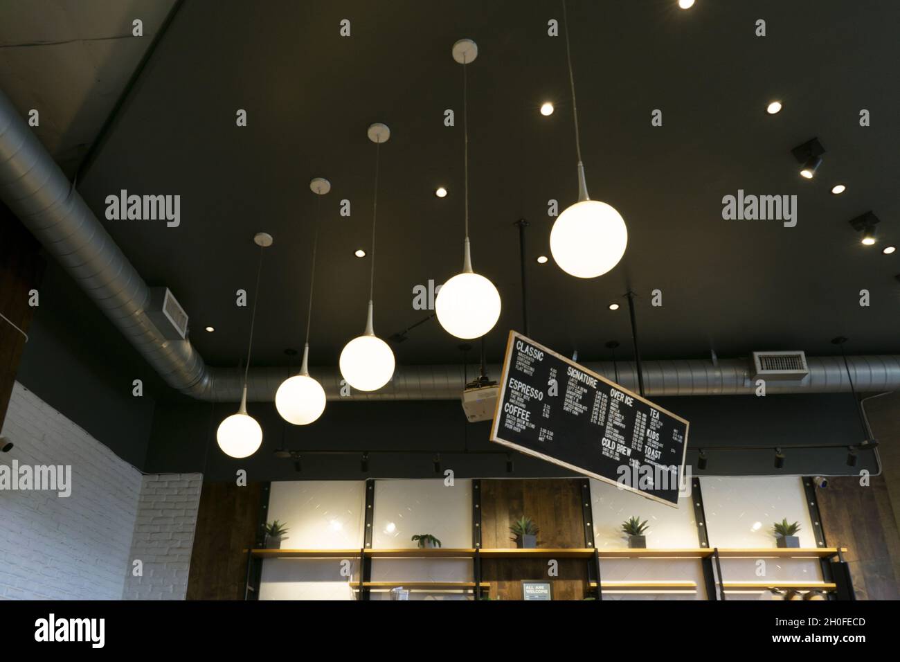 Minimal dark coffee shop interior hi-res stock photography and images ...