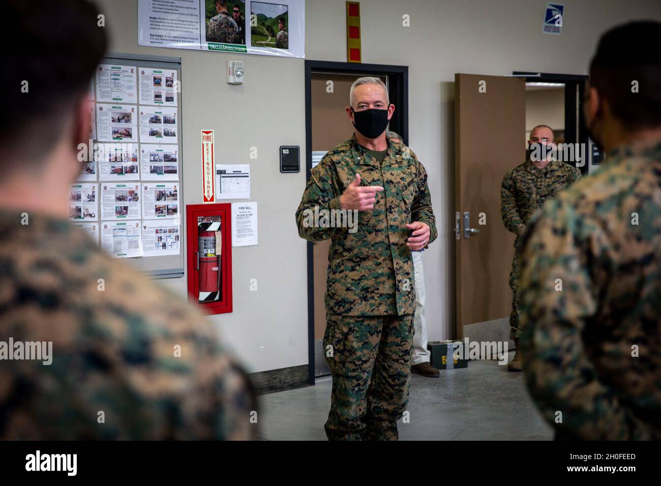U.S. Marine Brig. Gen. Dan Conley, center, the commanding general of ...