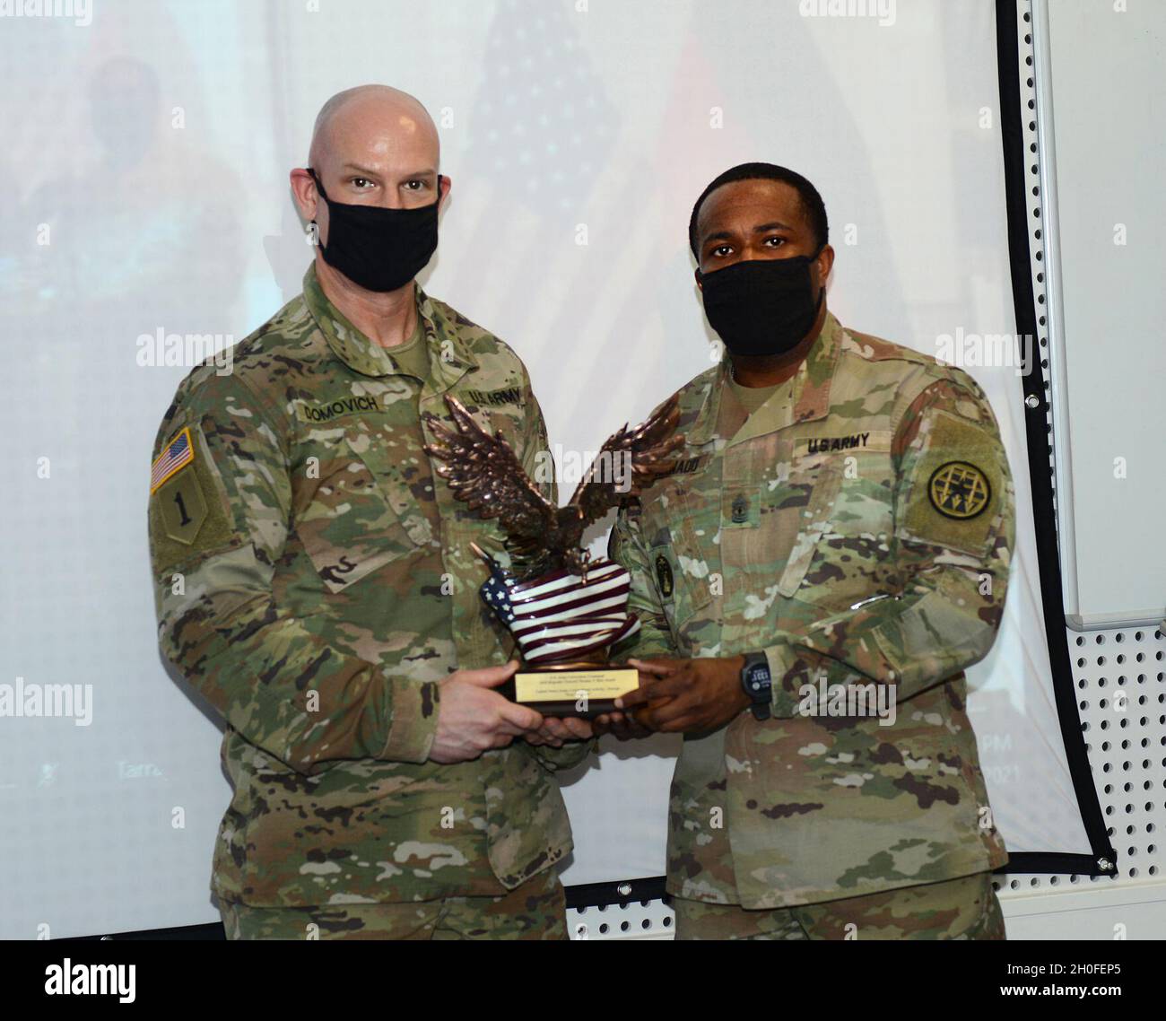 U.S. Army Maj. Michael Domovich, commander and 1st Sgt. Steven Varnado ...