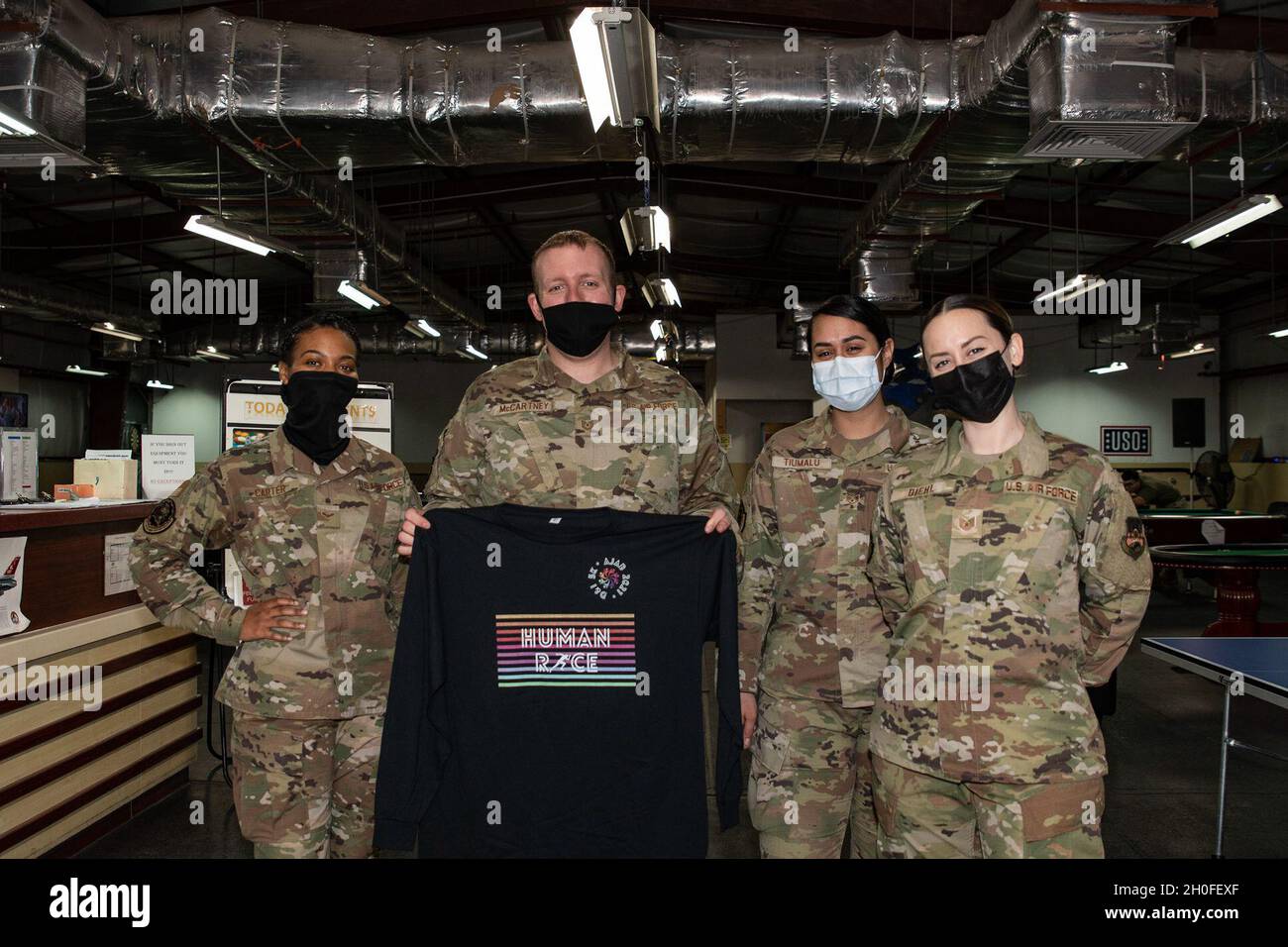 Airmen on the Diversity and Inclusion committee display their Black ...