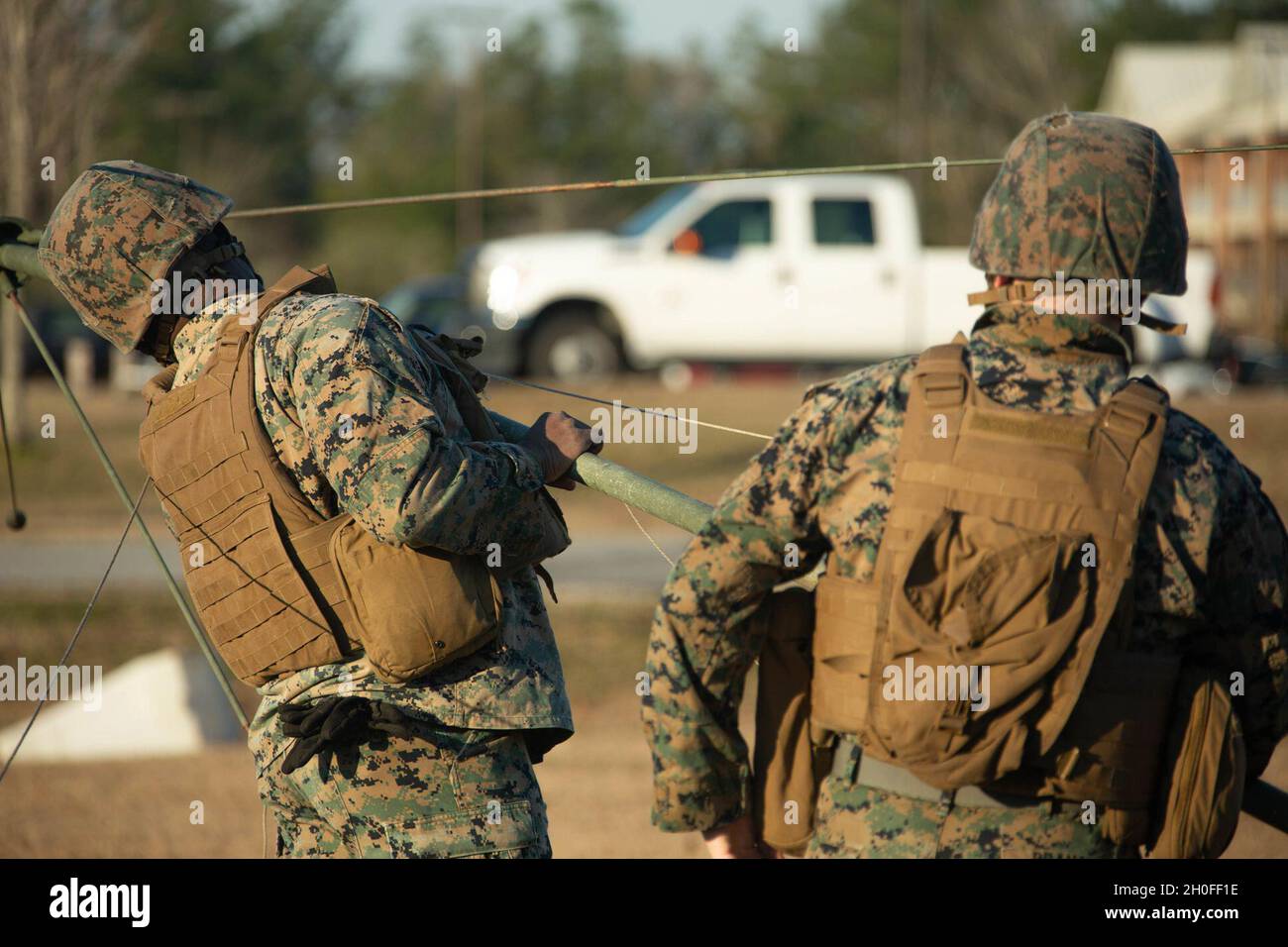 U.S. Marine Corps Lance Cpl. Steven Clervil (left) and Cpl. Mitchell ...