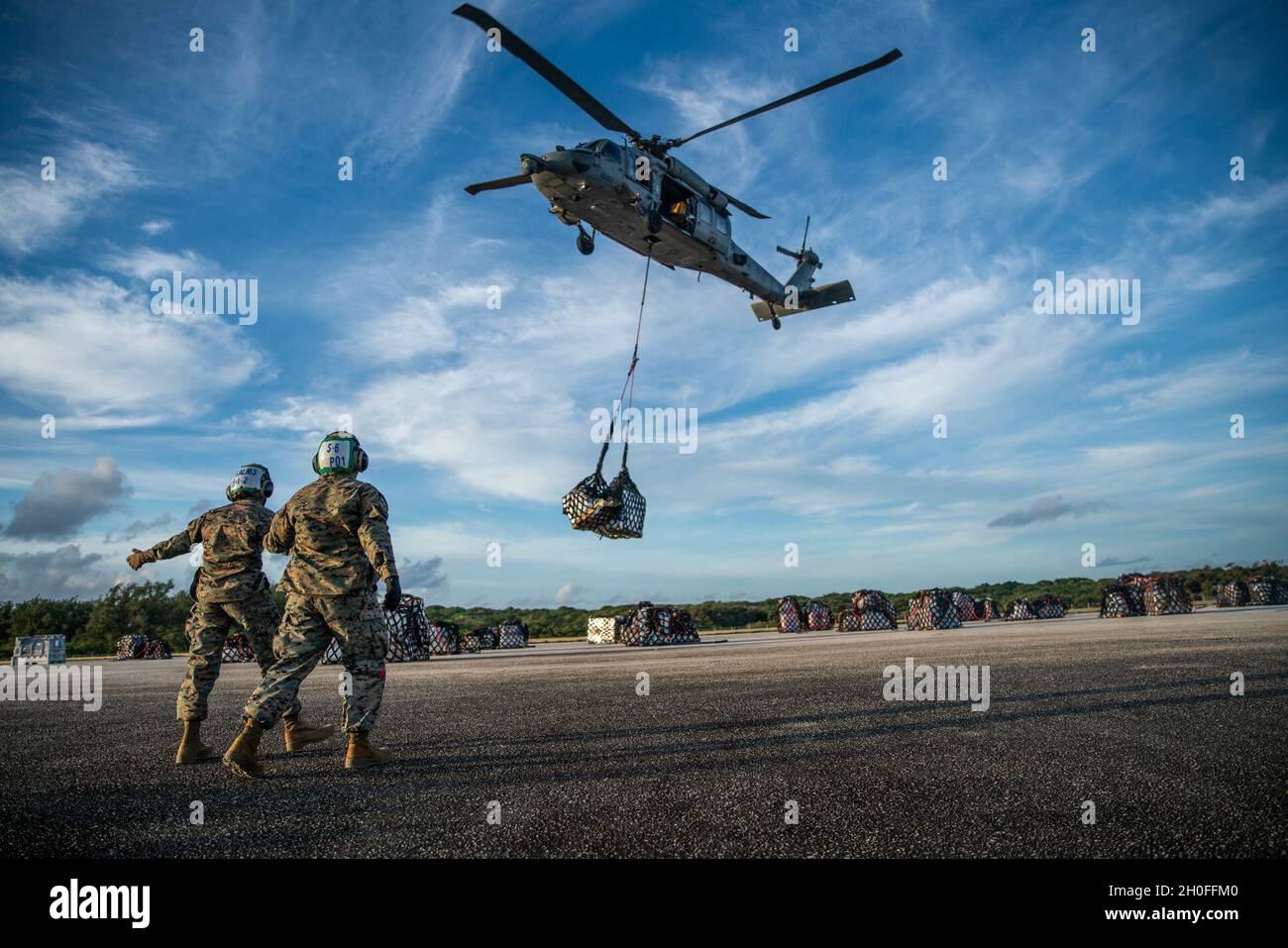 U.S. Marine Corps Lance Cpl. Alexis Bell and Lance Cpl. Adrian Medina ...