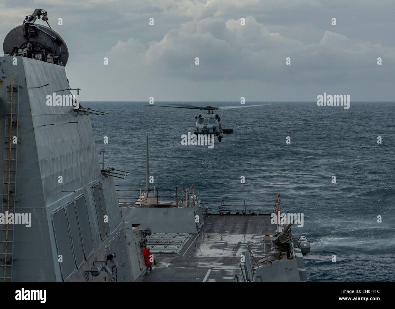 PACIFIC OCEAN (Feb. 25, 2021) An MH-60R Sea Hawk, assigned to the ...