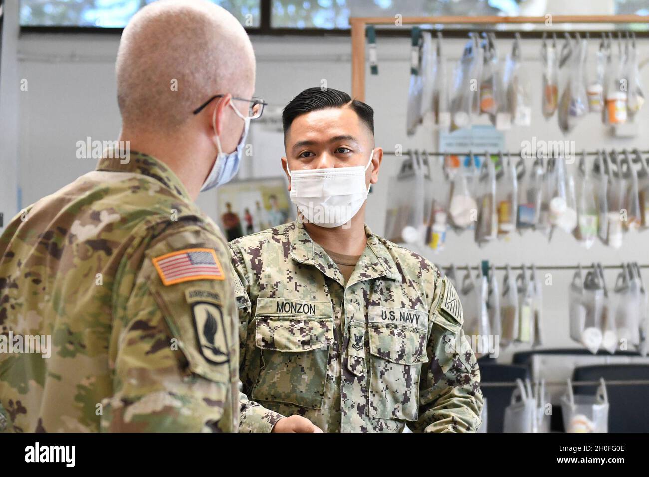 HM2 Ralph Monzon gave Defense Health Agency Director, LTG Ron Place a ...