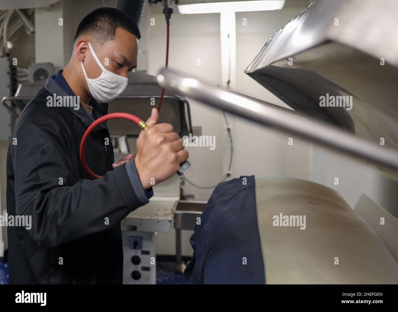 ARABIAN GULF (Feb. 25, 2021) – U.S. Navy Retail Specialist 3rd Class ...