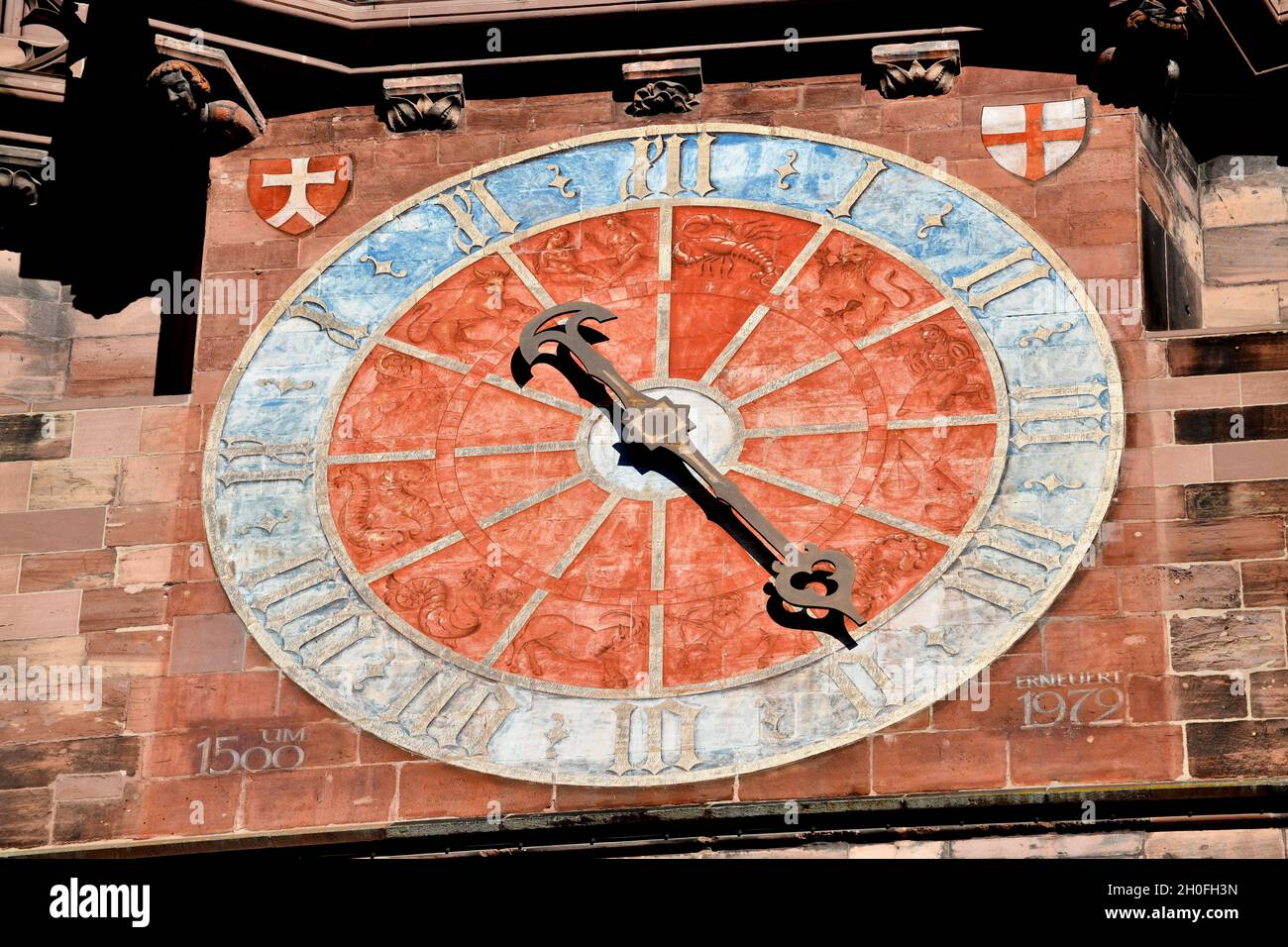 Freiburg cathedral clock hi-res stock photography and images - Alamy