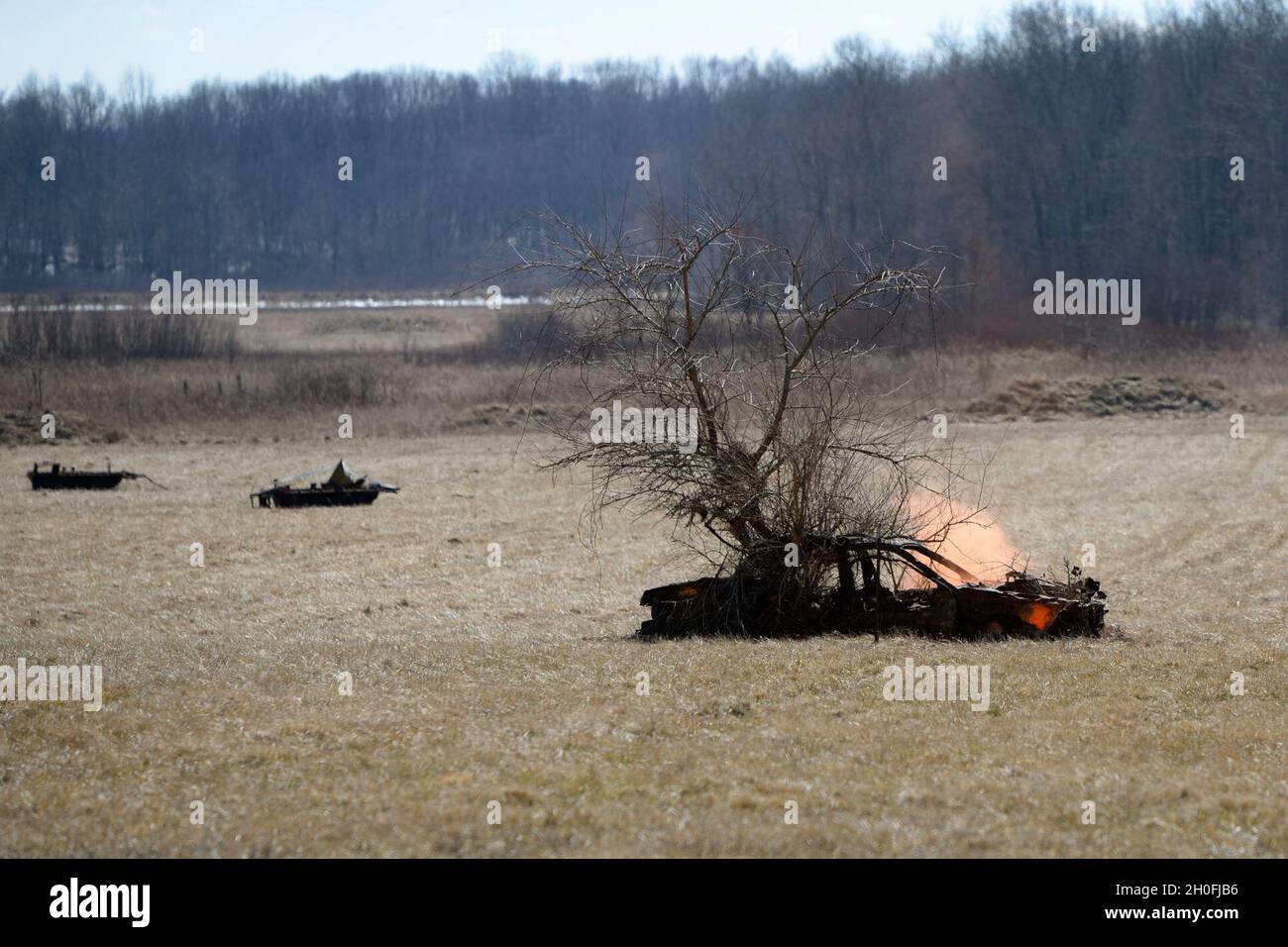 A 40mm practice grenade, known as Cheeto rounds, shot by U.S. Air Force ...